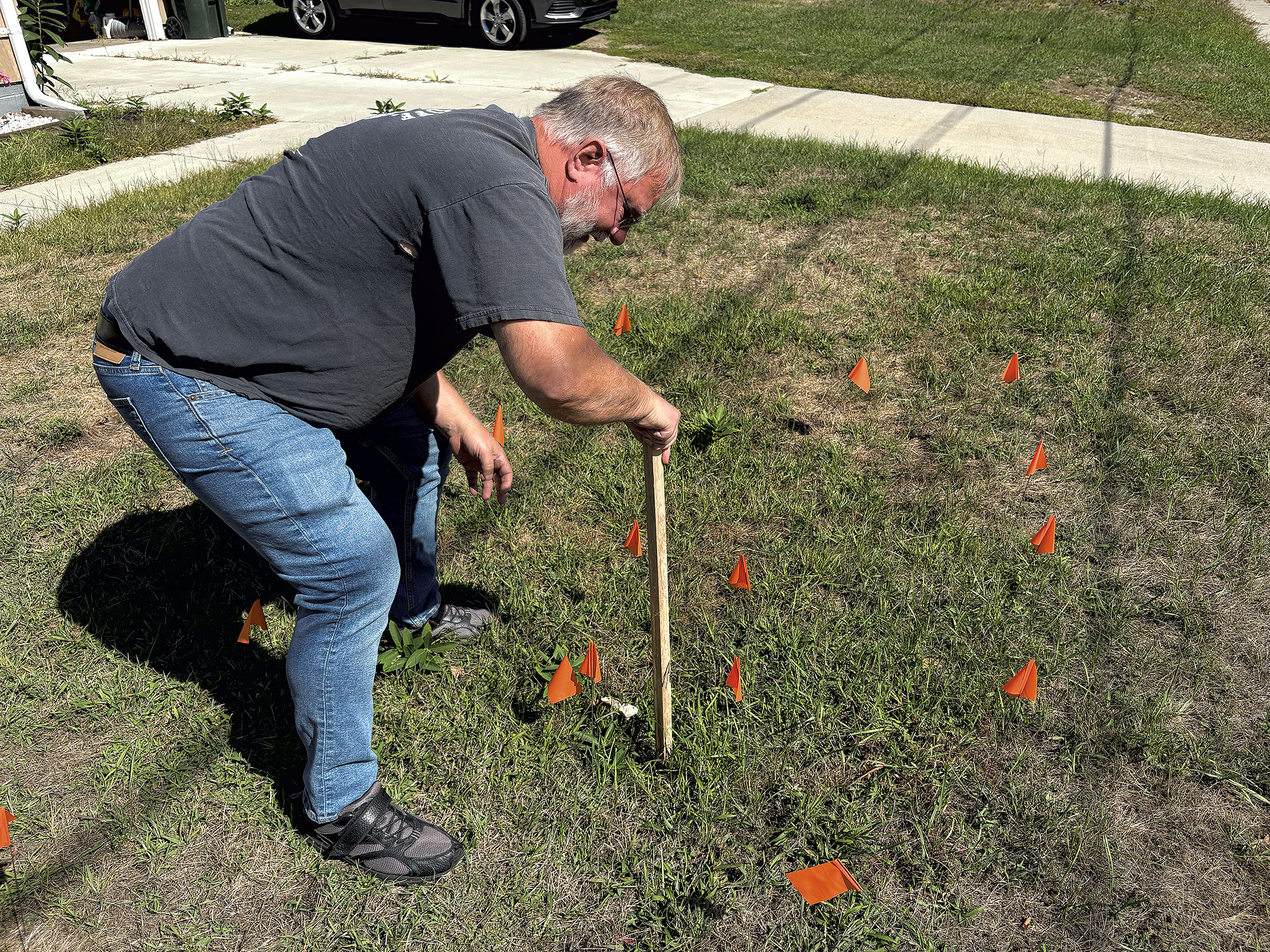 Random Holes Keep Opening Up in Yards on a Burlington Street